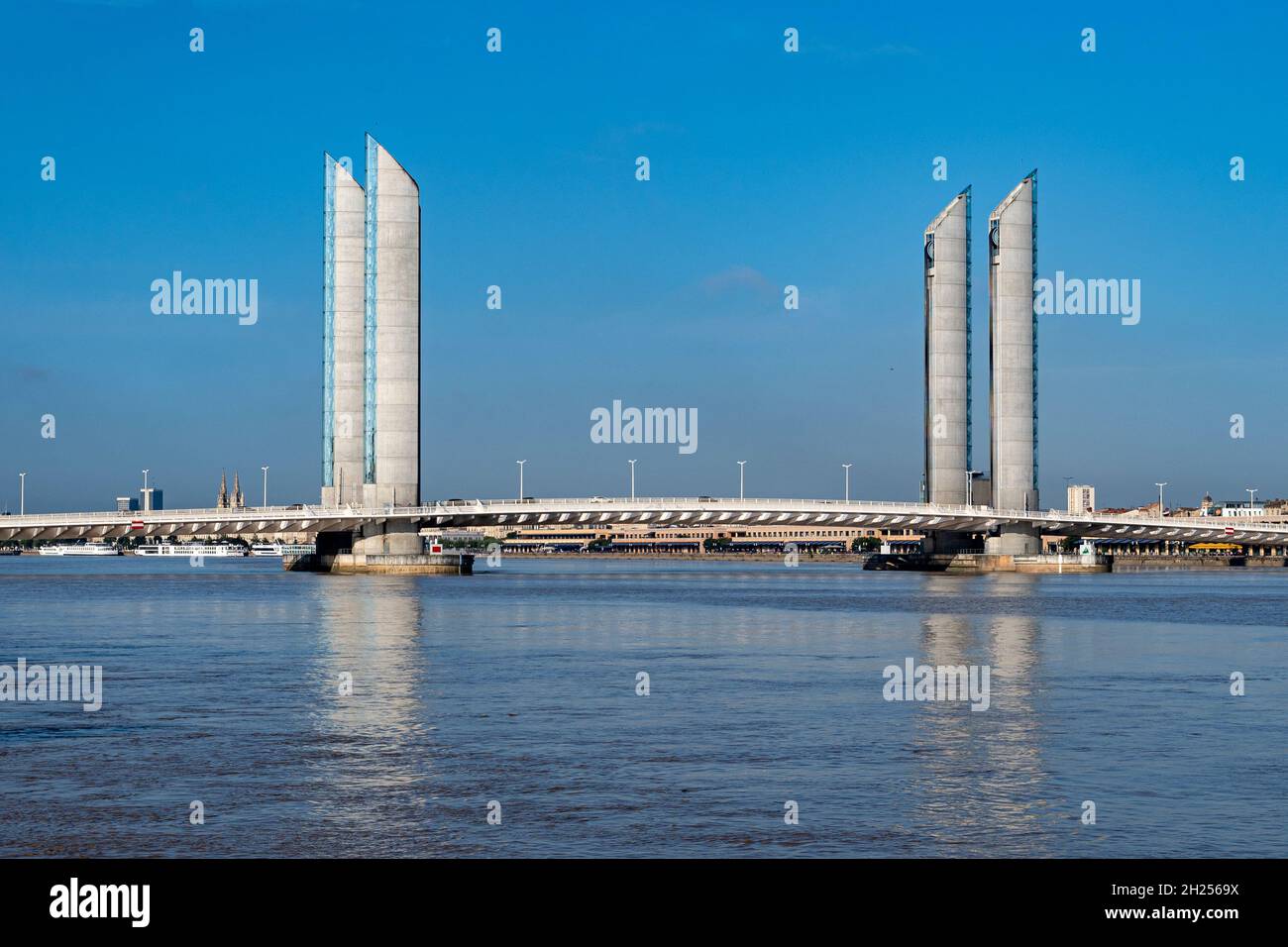 The modern bridge Pont Jacques Chaban-Delmas crossing the Garonne river ...