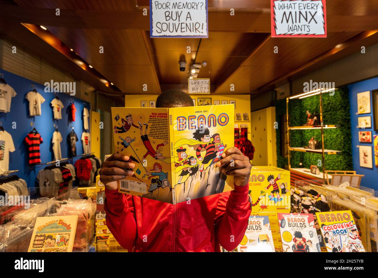 London, UK. 20 October 2021. A visitor reads the latest Beano annual ...