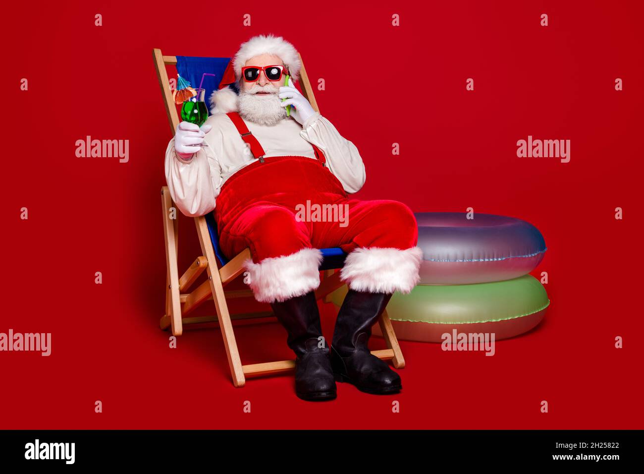 Photo of funky fat man pensioner dressed santa claus costume sitting ...