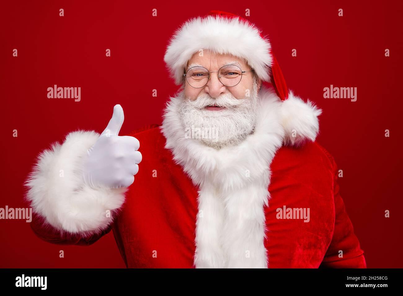 Photo of excited funny retired man wear santa claus costume spectacles ...