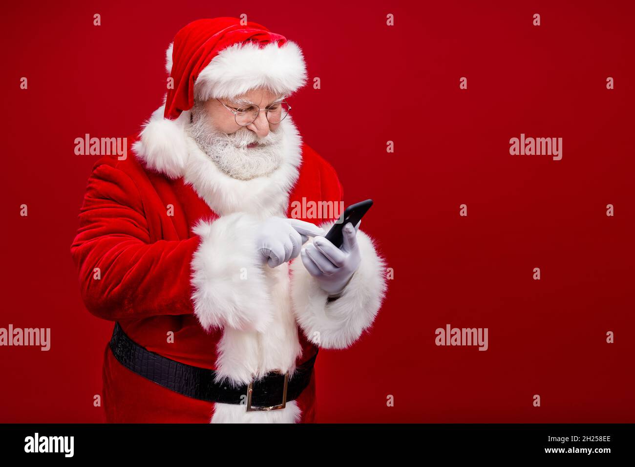 Photo of funny positive retired man wear santa claus costume spectacles ...