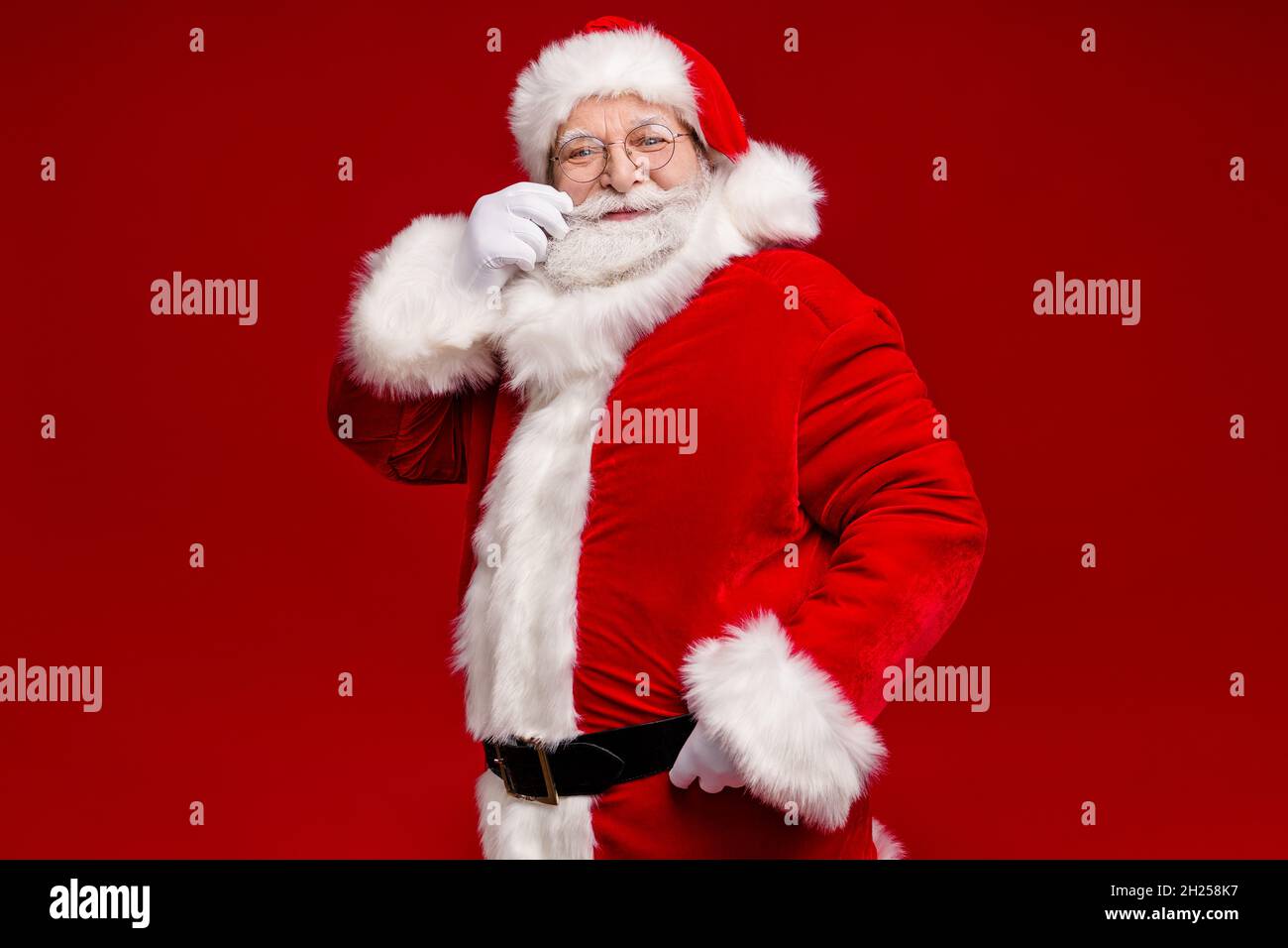 Photo of funky positive retired man wear santa claus costume belt ...