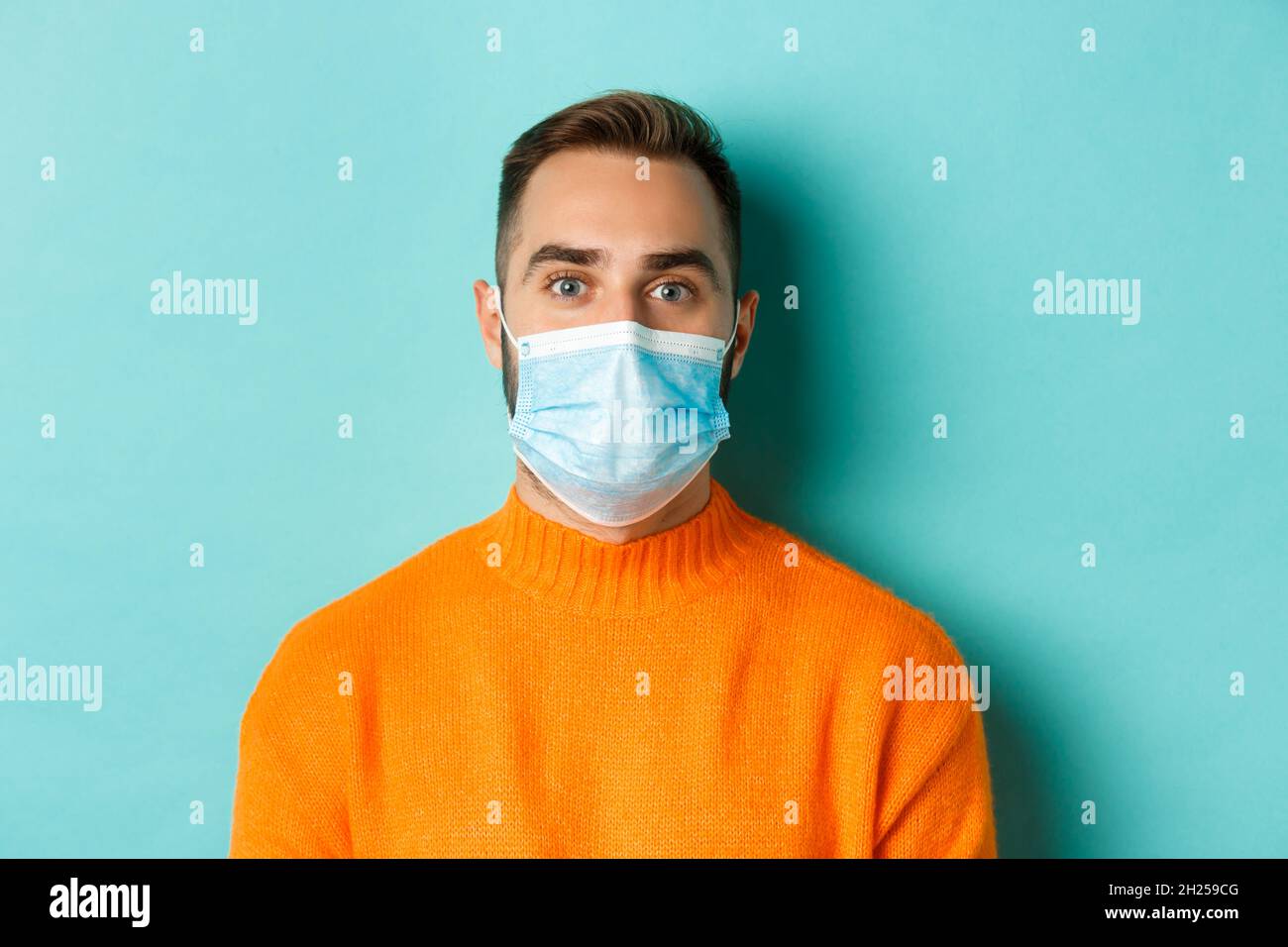 Covid-19, social distancing and quarantine concept. Close-up of young ...