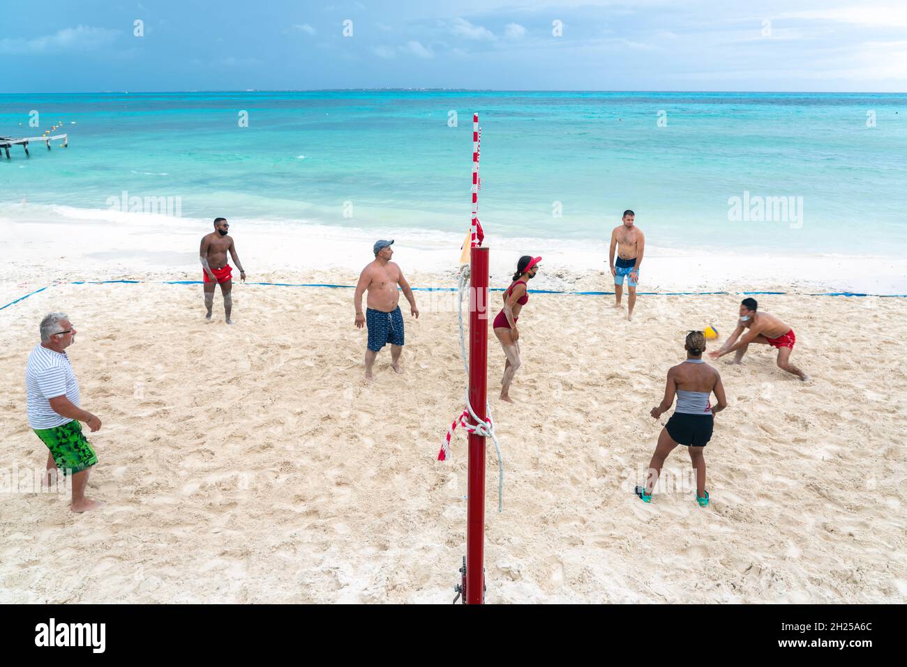 Cancun, Mexico - September 11, 2021: Tourists playing volleyball on the ...