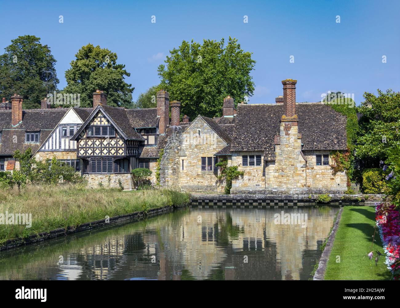Cottages and Tudor gardens at Hever Castle located in the village of ...
