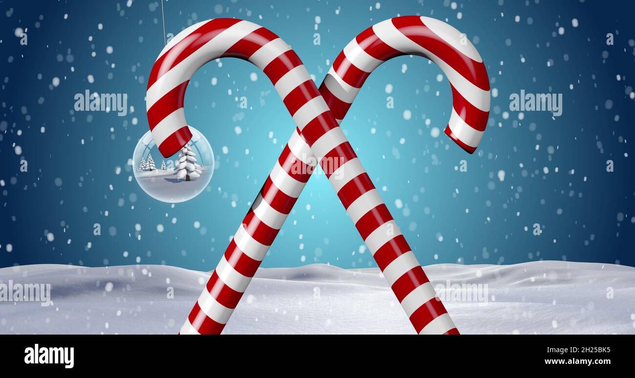 Image of candy canes over christmas tree ball in winter scenery Stock ...