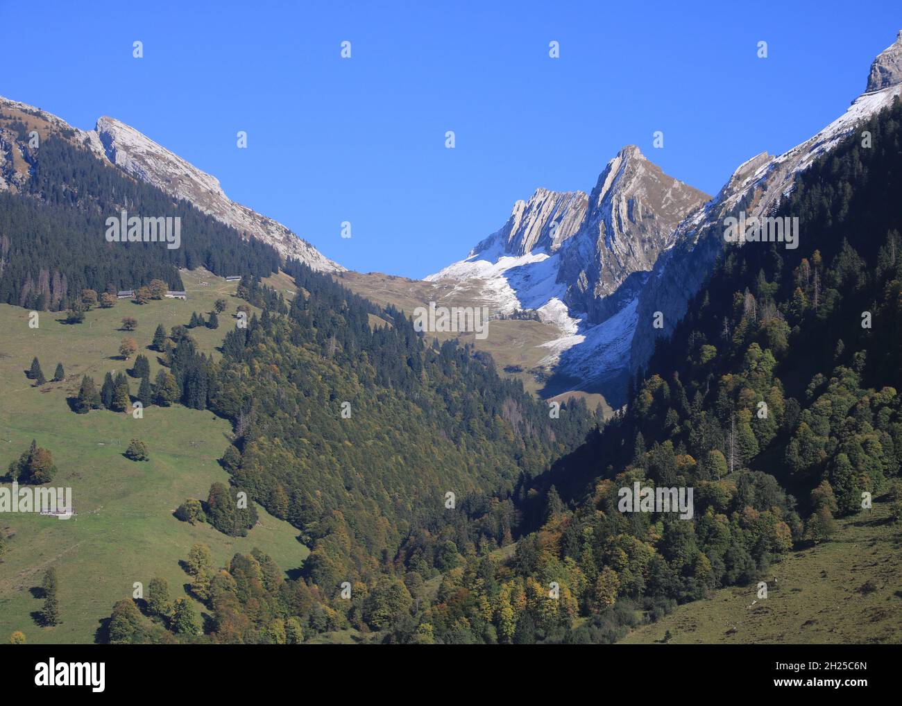 Stunning rock layers on peaks in the Swiss Alps Stock Photo - Alamy