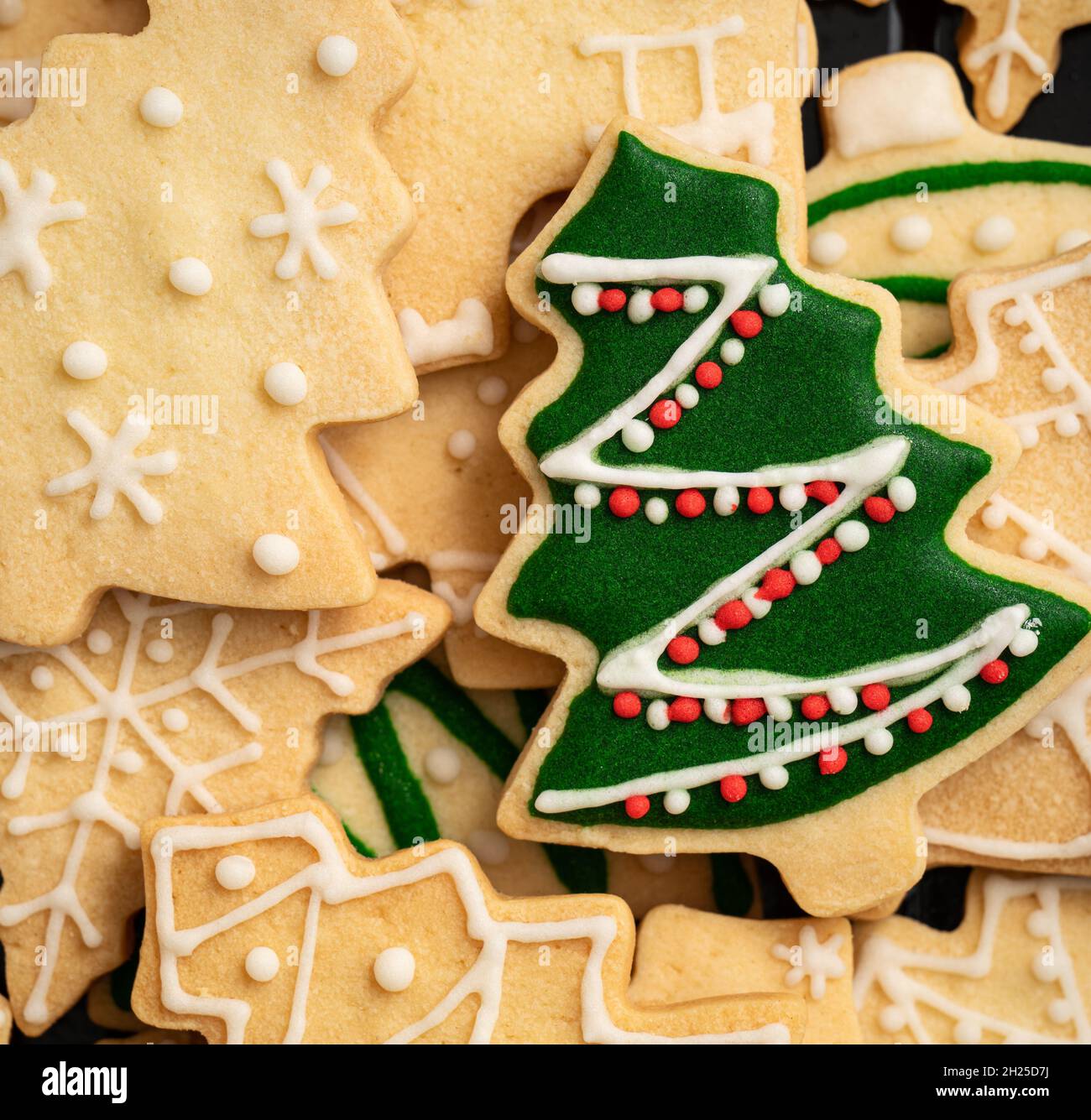 Top view of decorated green plain flavor gingerbread Christmas tree ...
