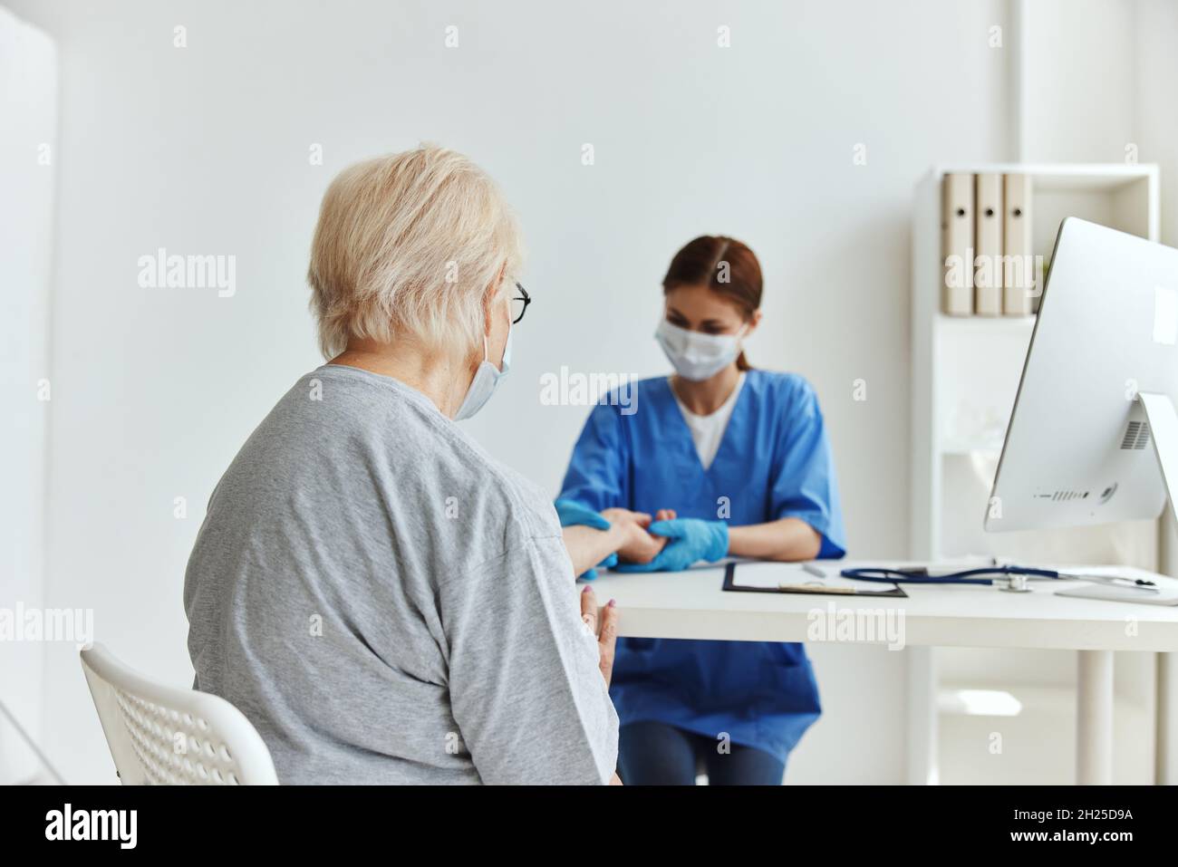 female doctor patient examination treatment Stock Photo - Alamy