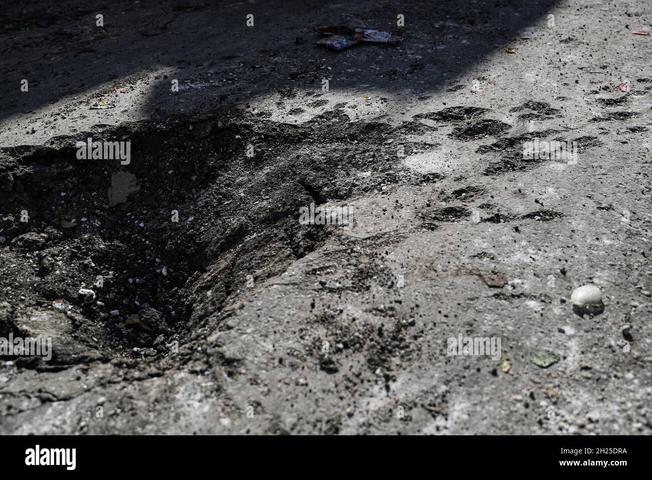 Ariha, Syria. 20th Oct, 2021. A general view of a bomb crater at a site ...