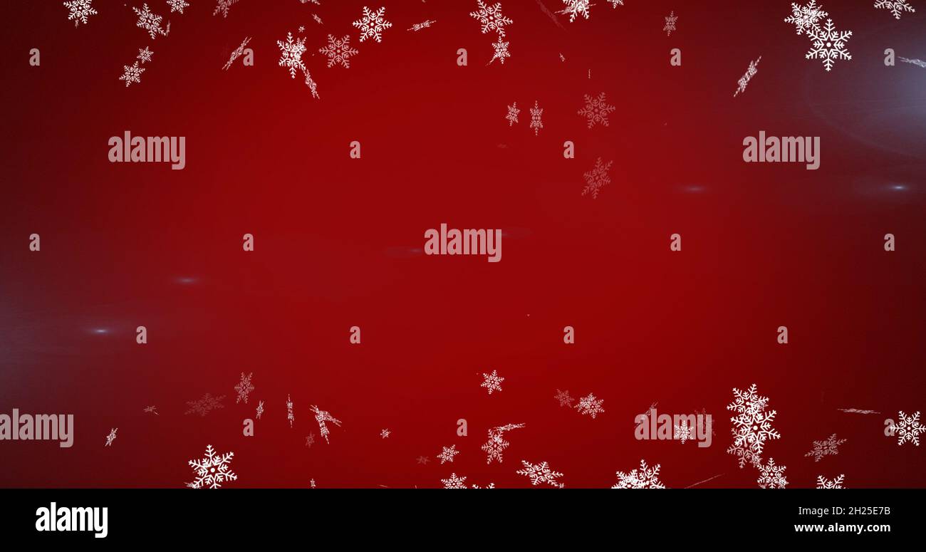 Image of falling snowflakes on red background Stock Photo - Alamy