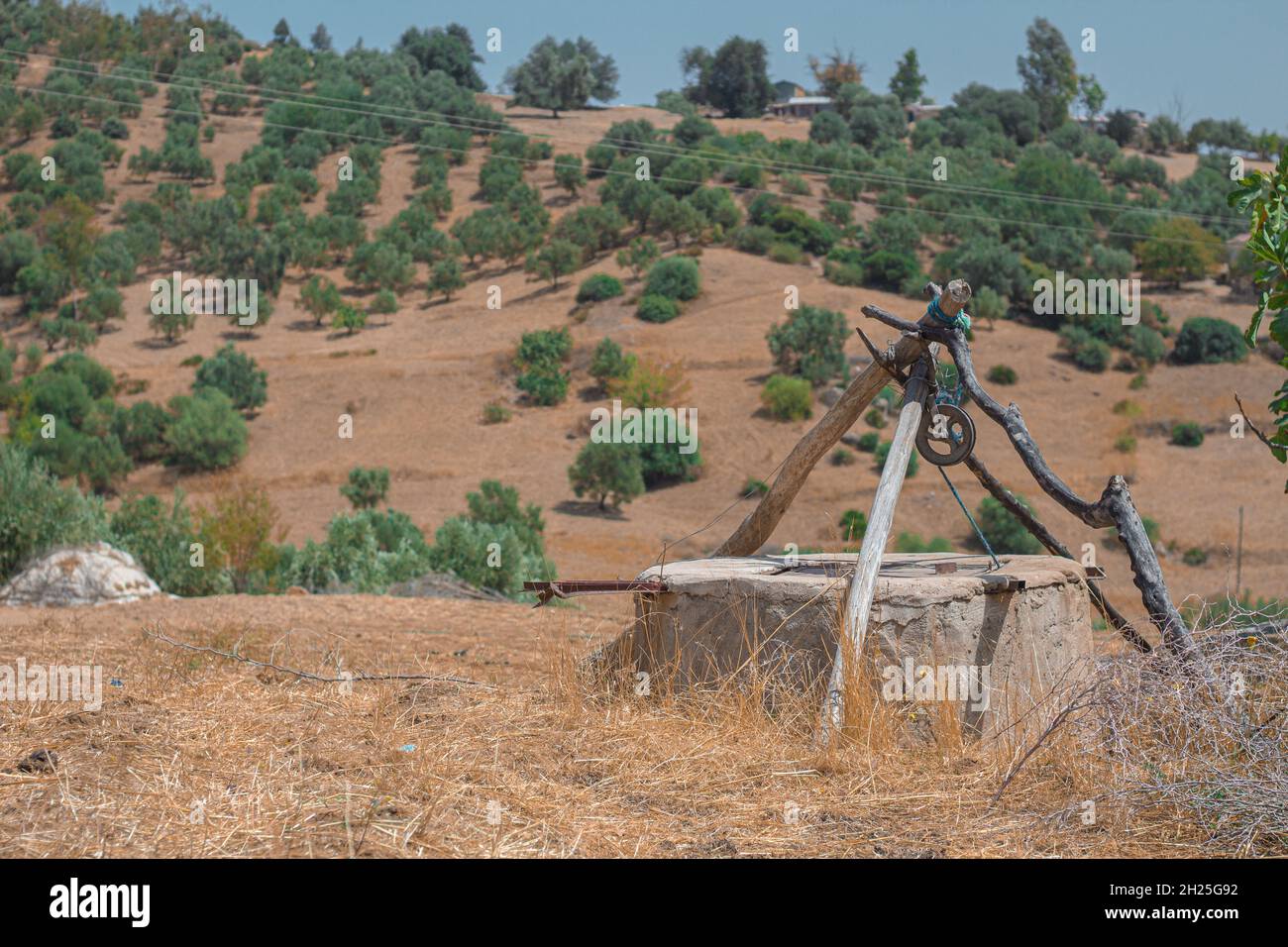 A traditional wood water well in a village in a Moroccan mountainous ...