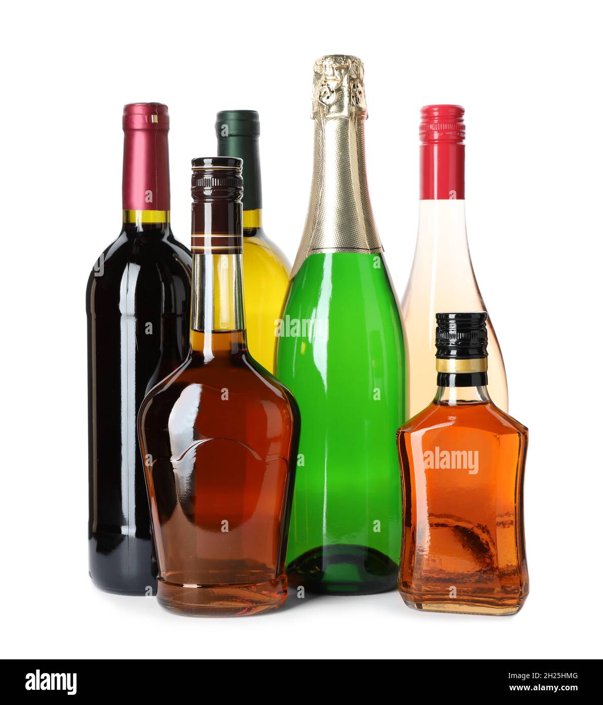 Bottles with different alcoholic drinks on white background Stock Photo ...