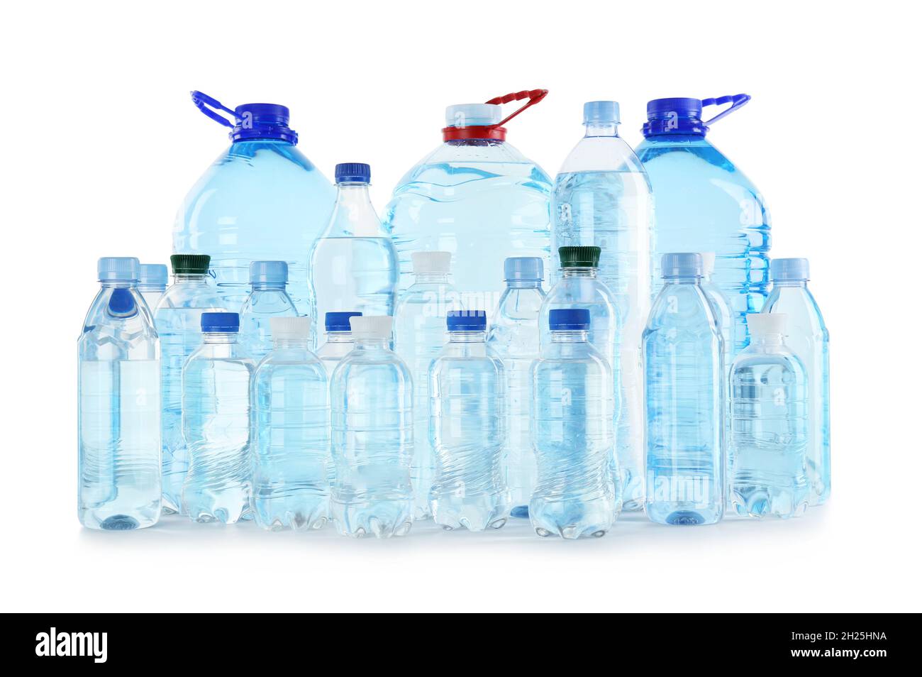 Set of different plastic bottles with pure water on white background ...