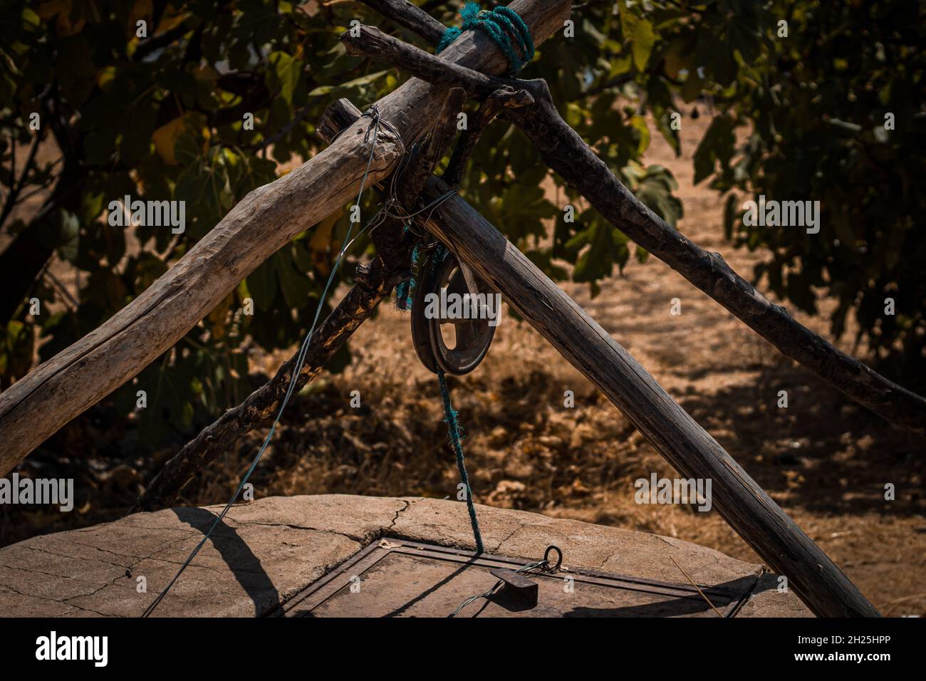 A traditional wood water well in a village in a Moroccan mountainous ...