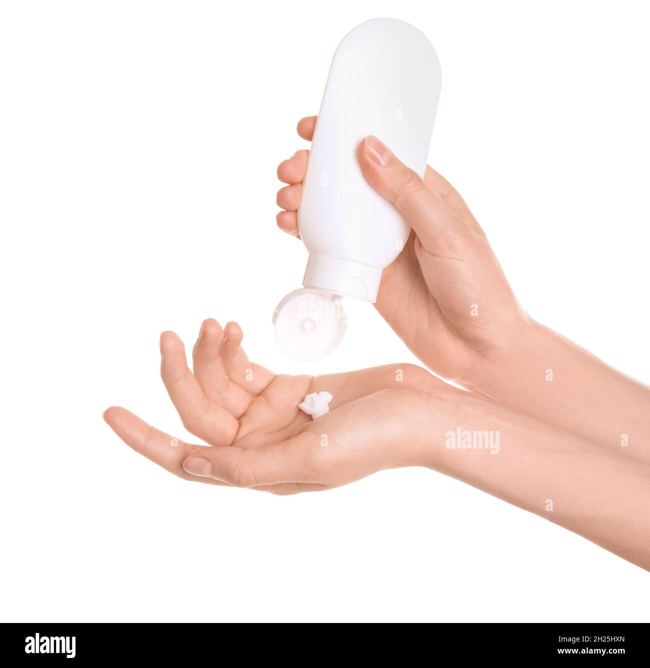 Young woman applying hand cream against on white background Stock Photo ...