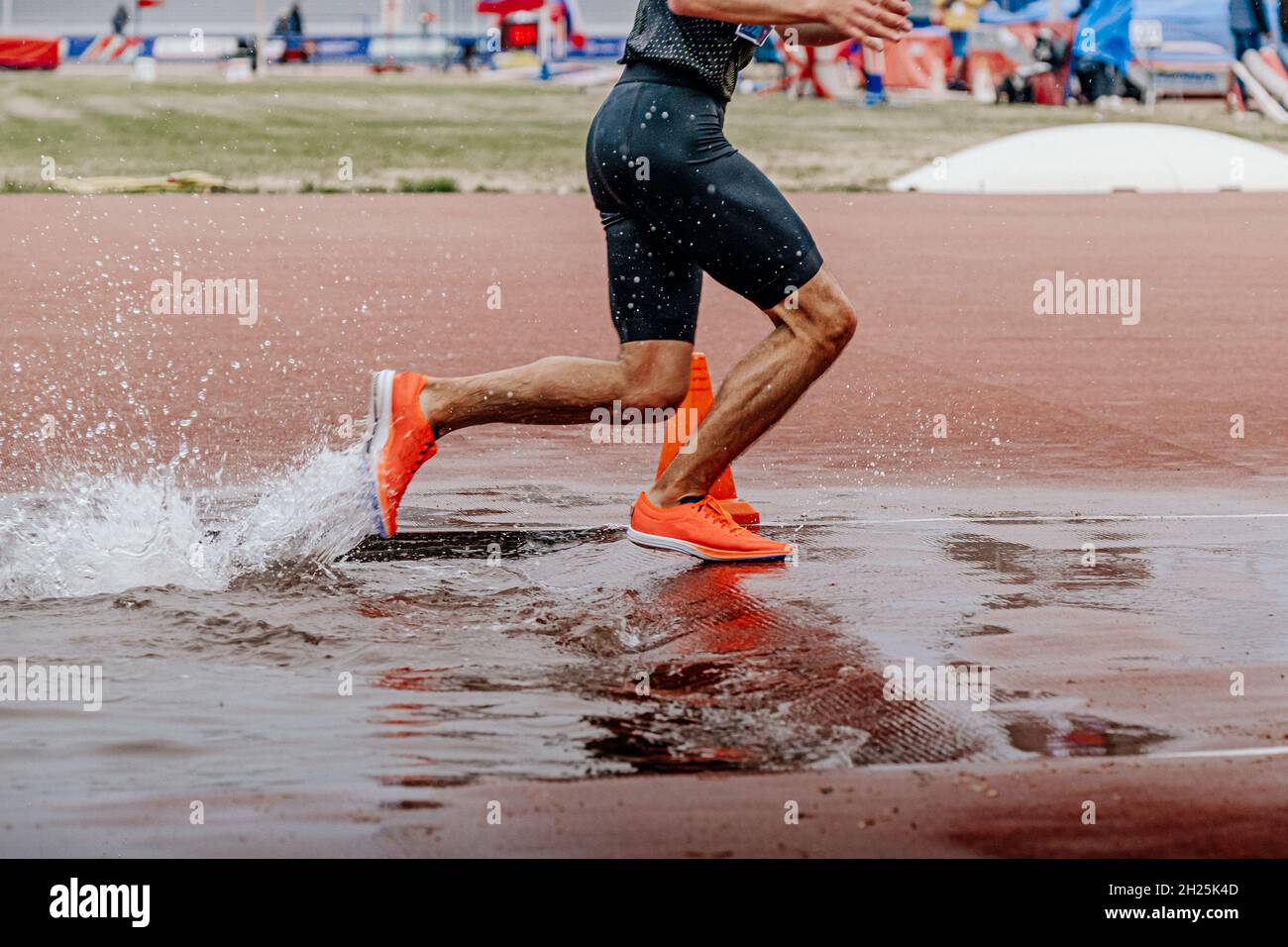 legs runner athlete run steeplechase in athletics Stock Photo - Alamy