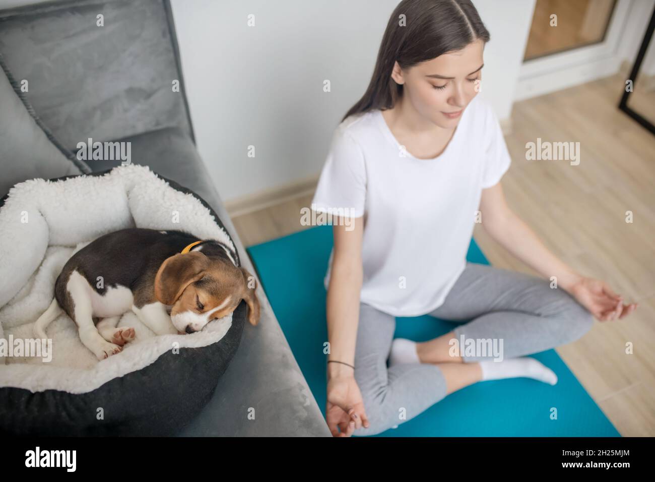 Sitting in a lotus pose hi-res stock photography and images - Alamy