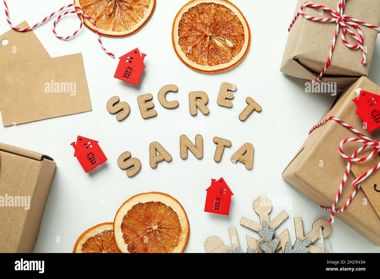 Secret Santa and Christmas composition on white background Stock Photo ...