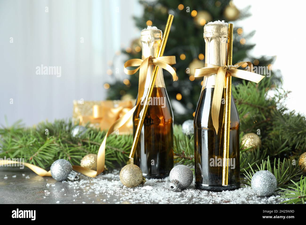 Concept of New Year celebration with champagne bottles Stock Photo - Alamy