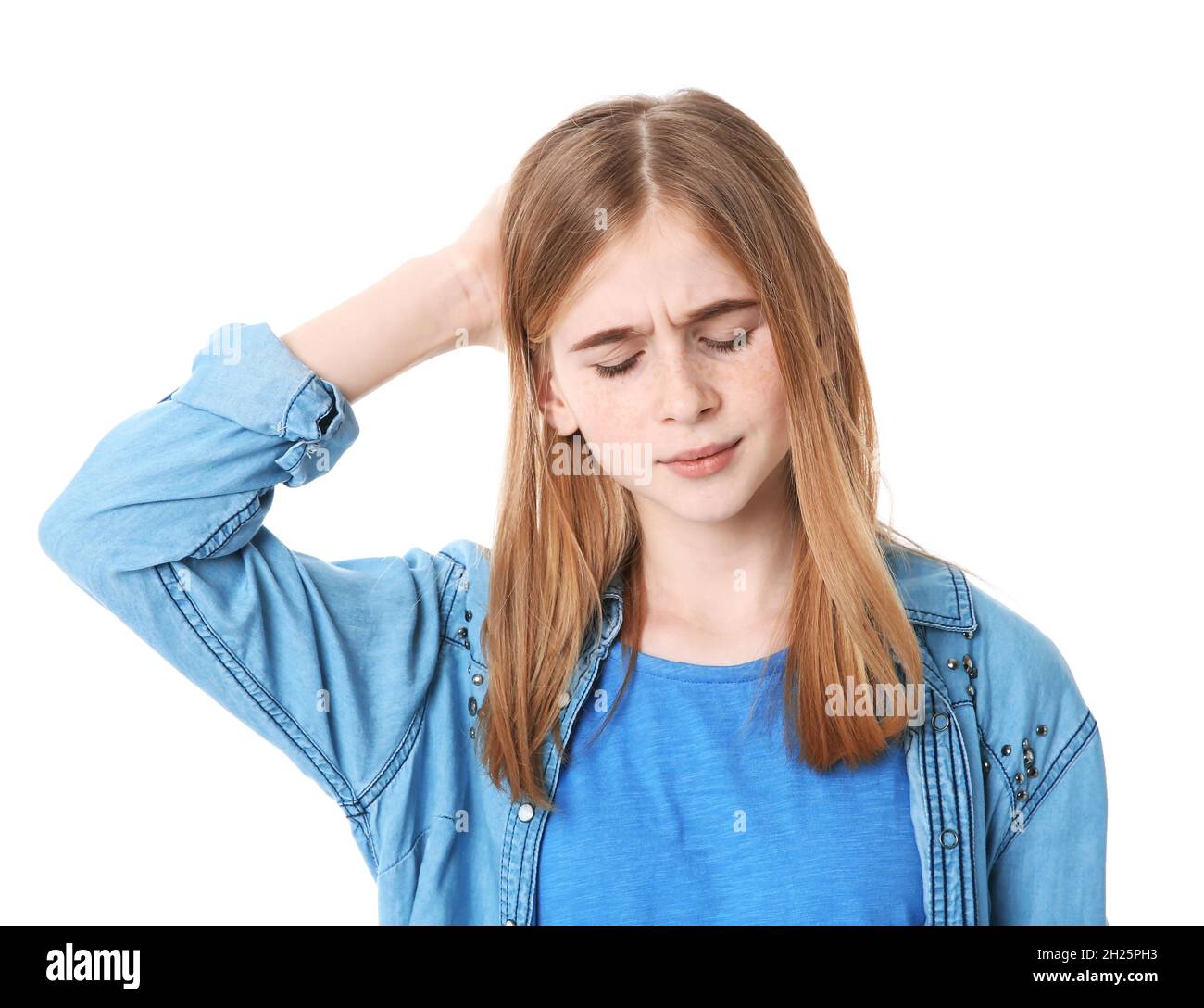 Teenage girl suffering from headache on white background Stock Photo ...
