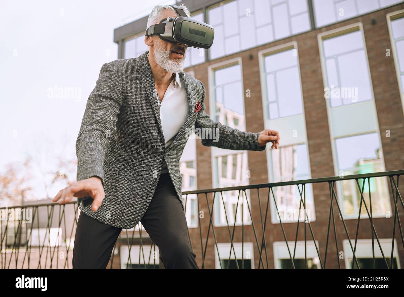 Person trying to balance hi-res stock photography and images - Alamy