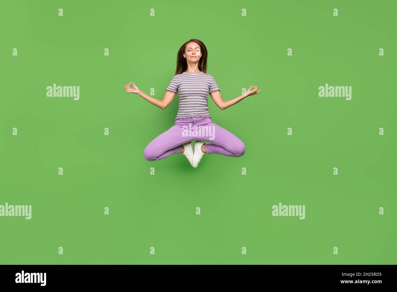 Full body photo of cheerful young positive peaceful woman jump up ...