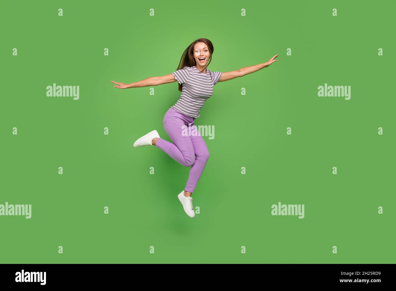 Full length body size view of attractive cheerful girl jumping fooling ...