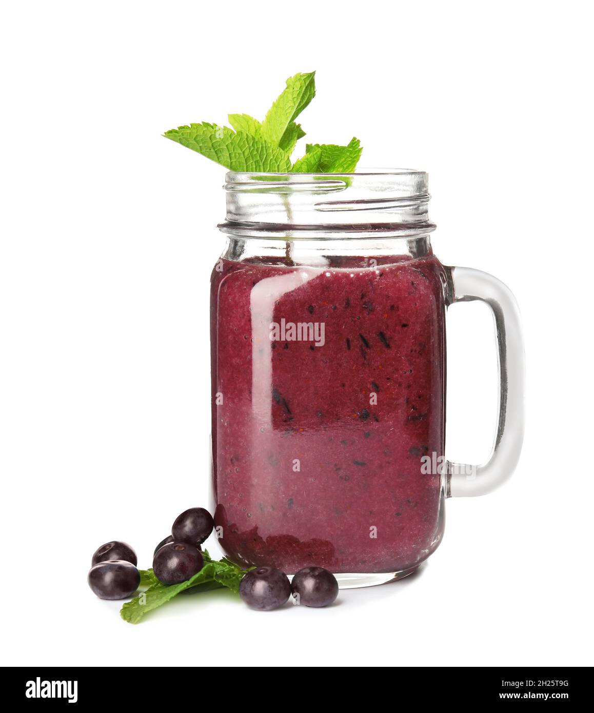 Mason jar with delicious acai smoothie on white background Stock Photo ...