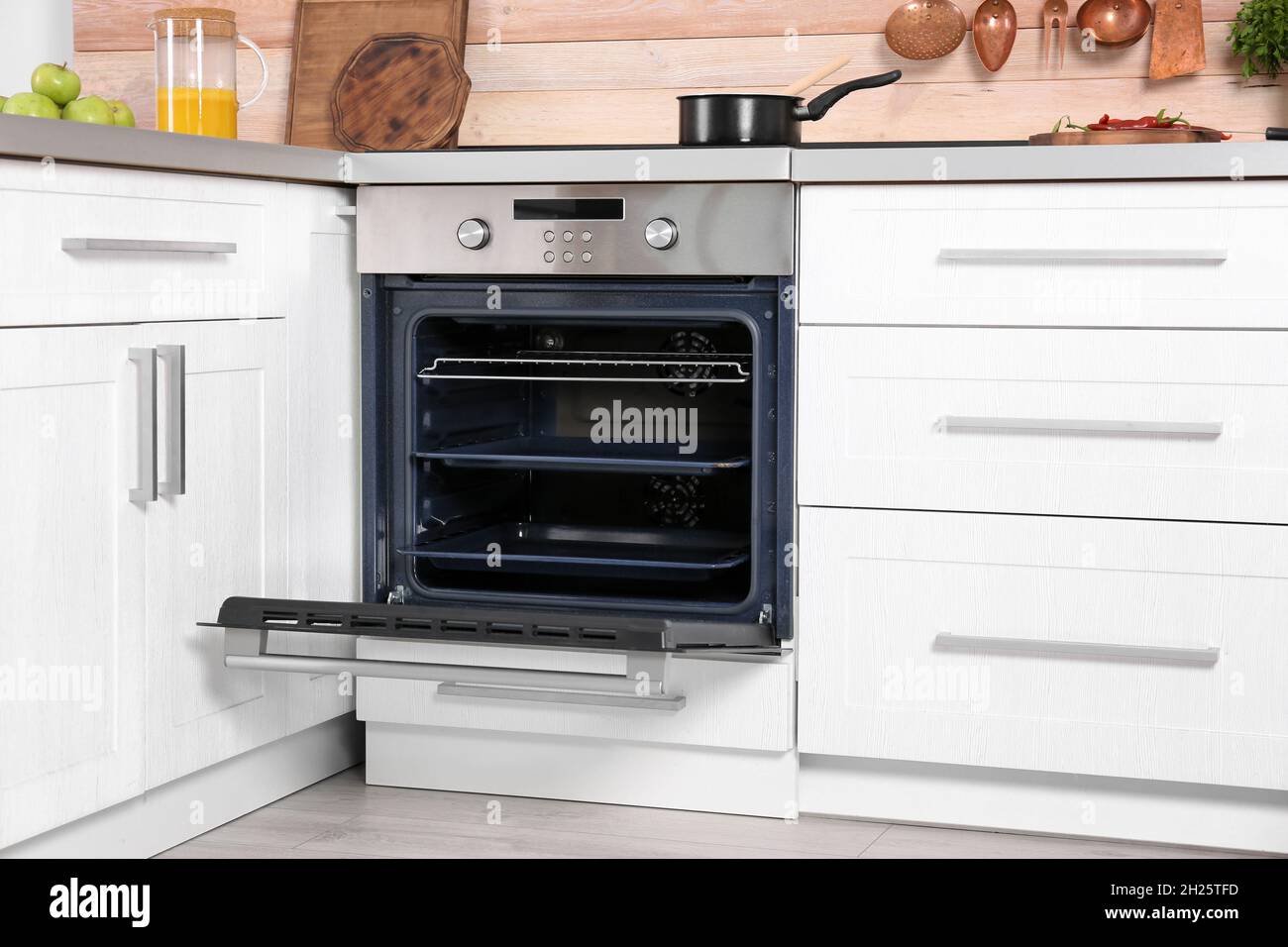 Open modern oven built in kitchen furniture Stock Photo - Alamy