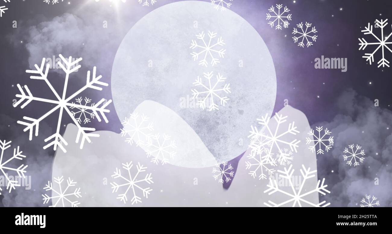 Image of snow falling over full moon Stock Photo - Alamy