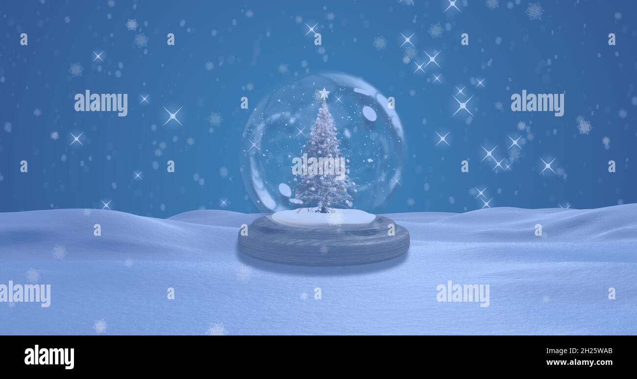 Image of christmas tree over snow falling and winter scenery Stock ...