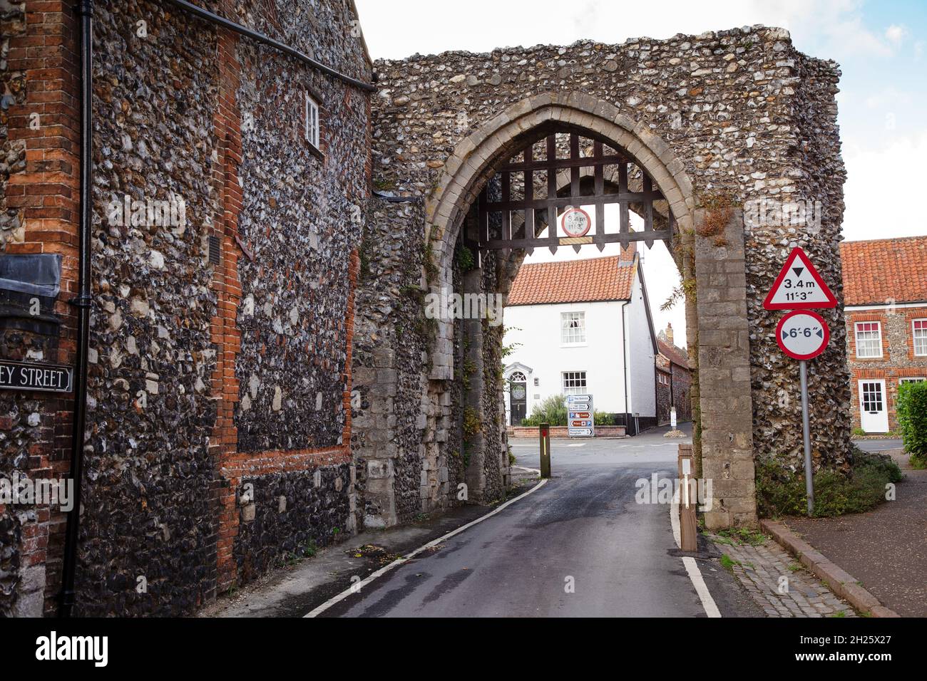 A stone gatehouse is still the main way by road into the village of ...