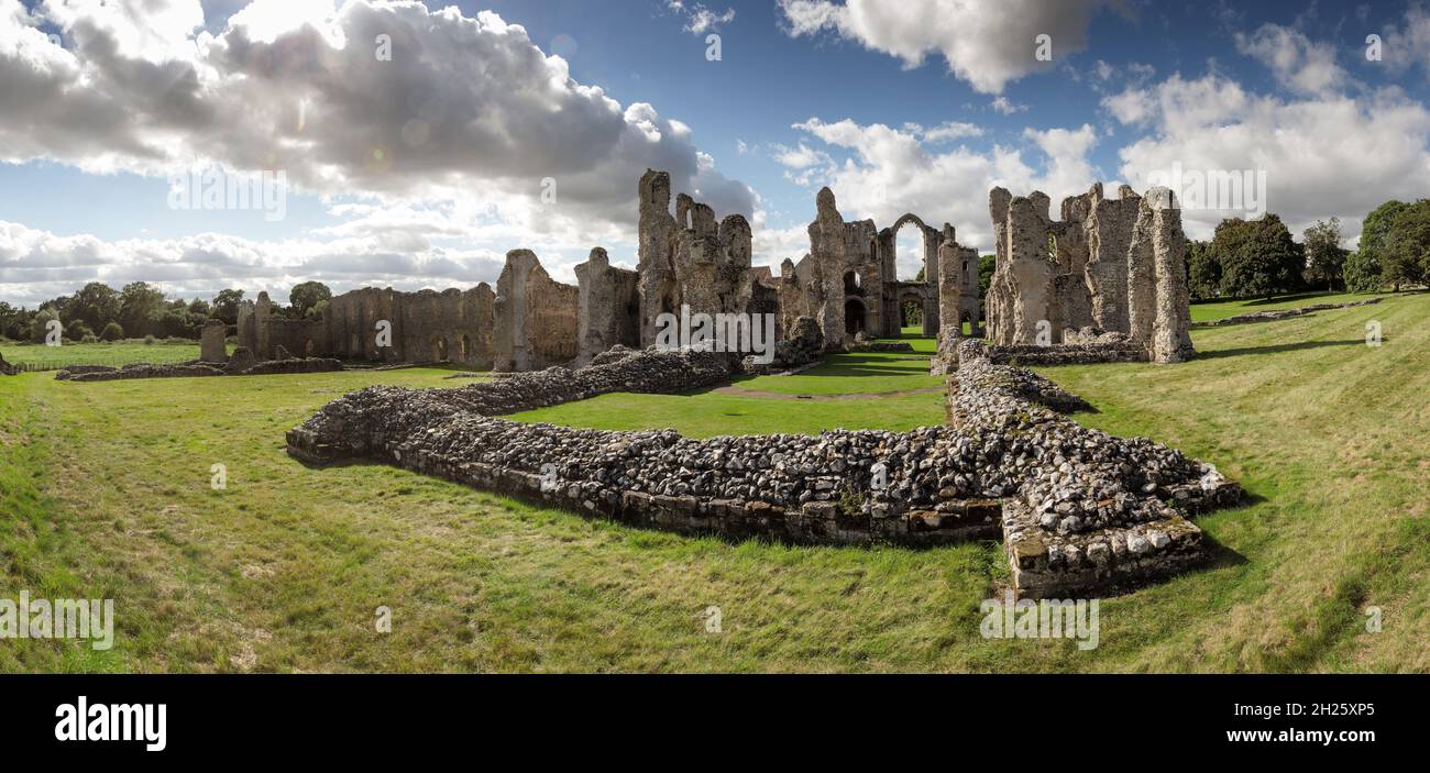 panoramic landscape image of the ruins of Castle Acre Priory a medieval ...