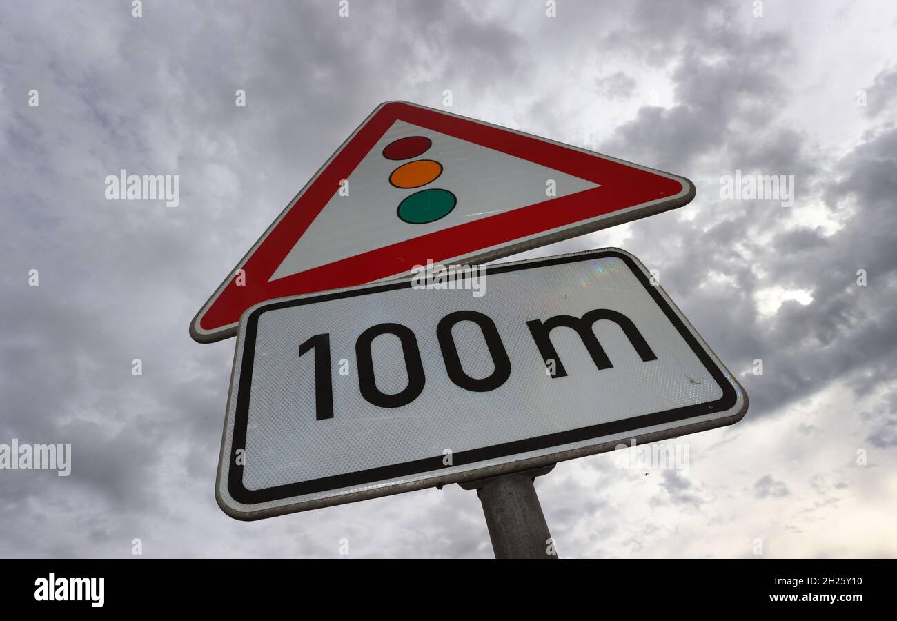 20 October 2021, Bavaria, Würzburg: Two signs indicate a traffic light ...
