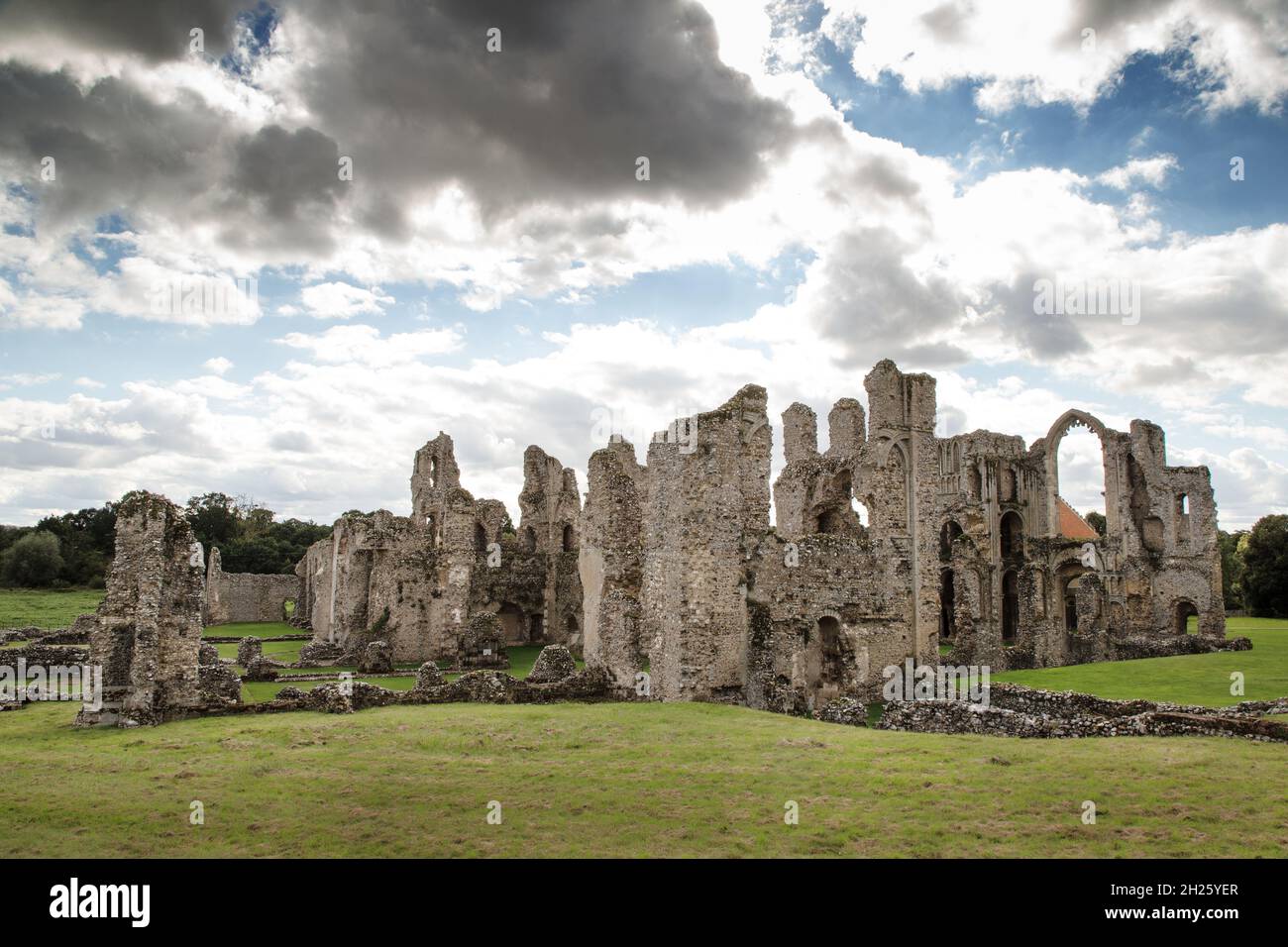 landscape image of the ruins of Castle Acre Priory a medieval building ...