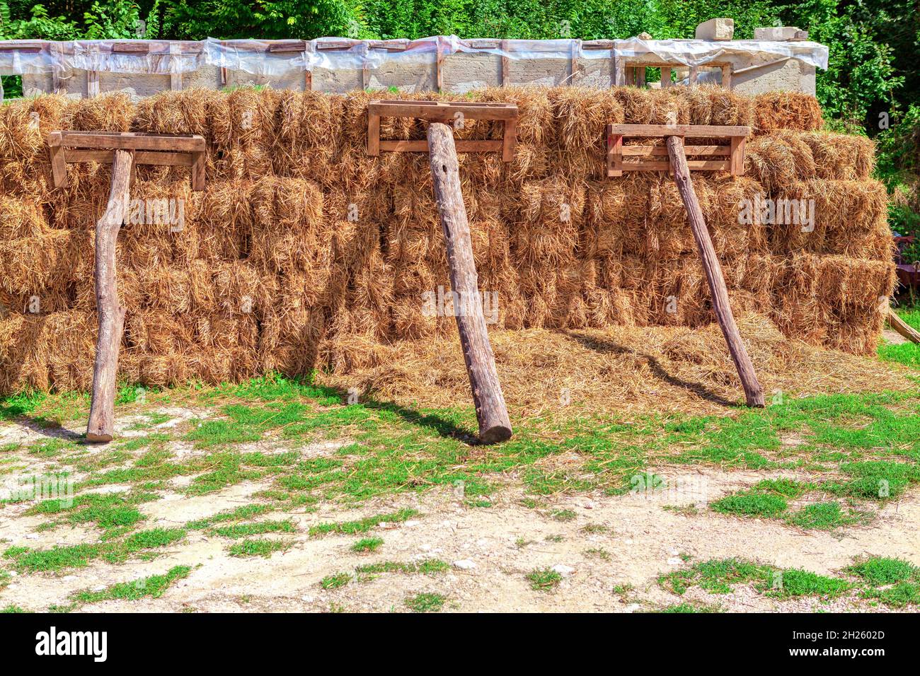 Haystack stacked in the Barn . Livestock fodder . Pile of straw Stock ...