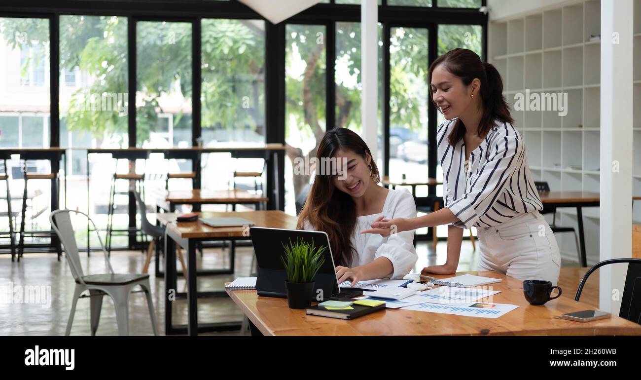 Friendly female colleagues having good relationships, pleasant ...