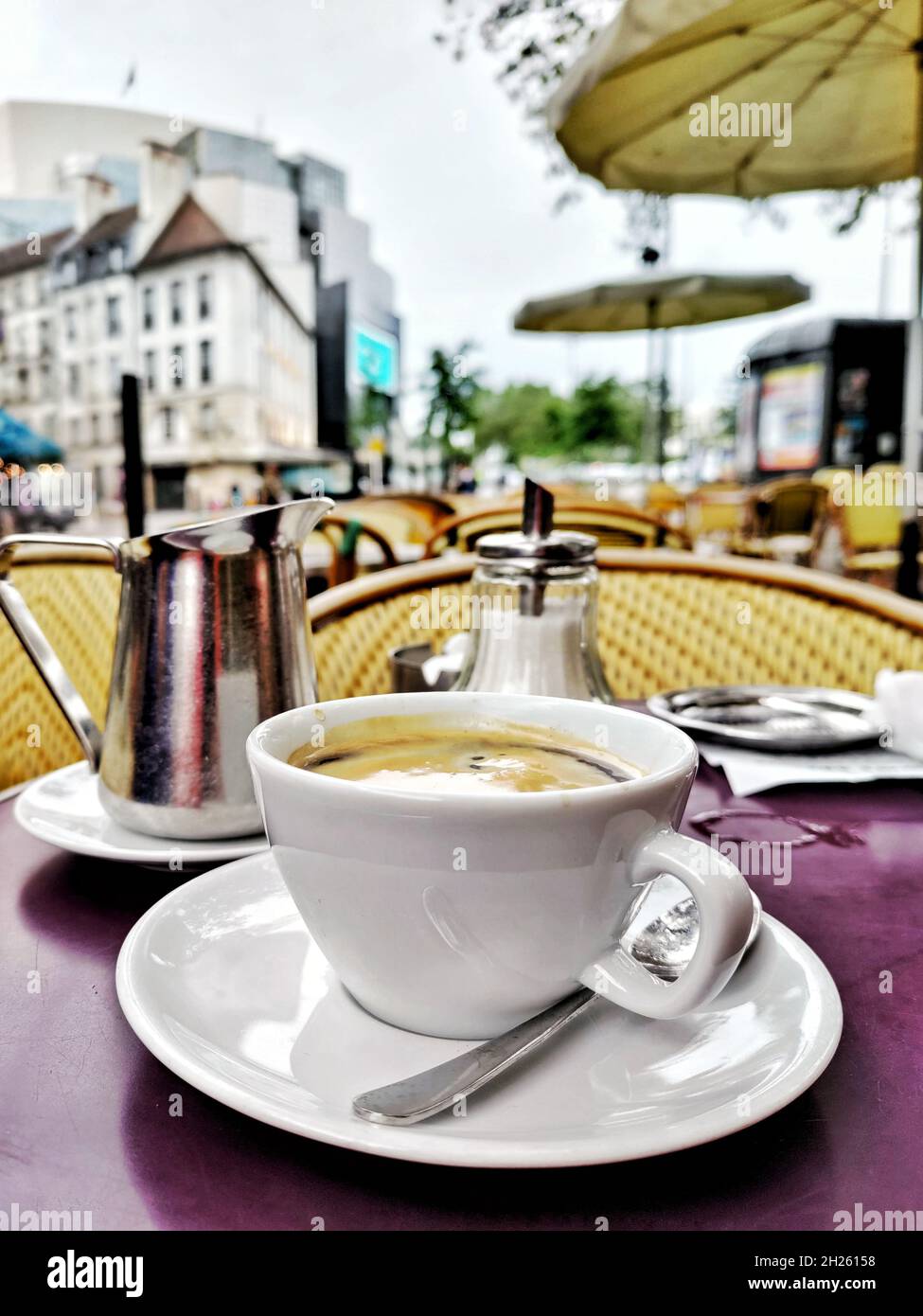 Vertical shot of a traditional French Parisian outdoor cafe Stock Photo ...