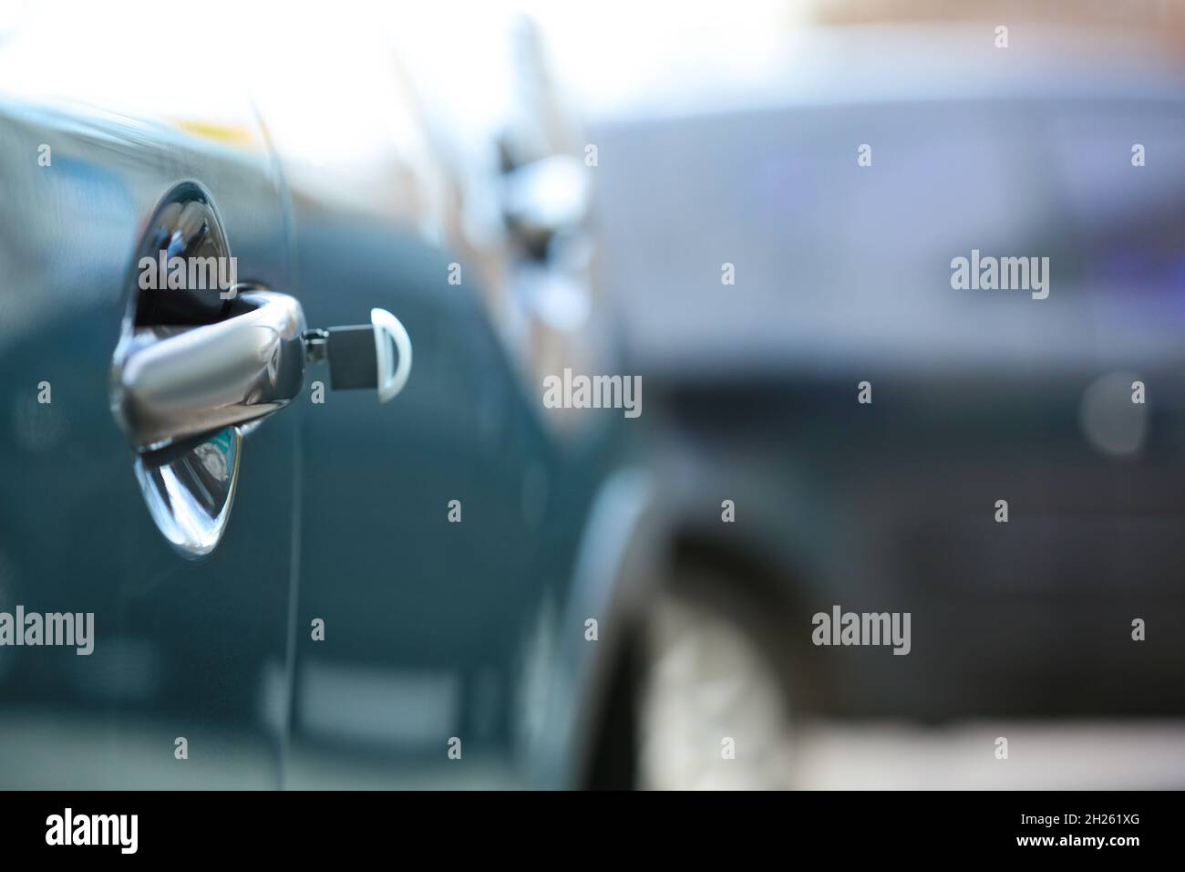 Closeup view of car door with key in lock. Space for text Stock Photo ...