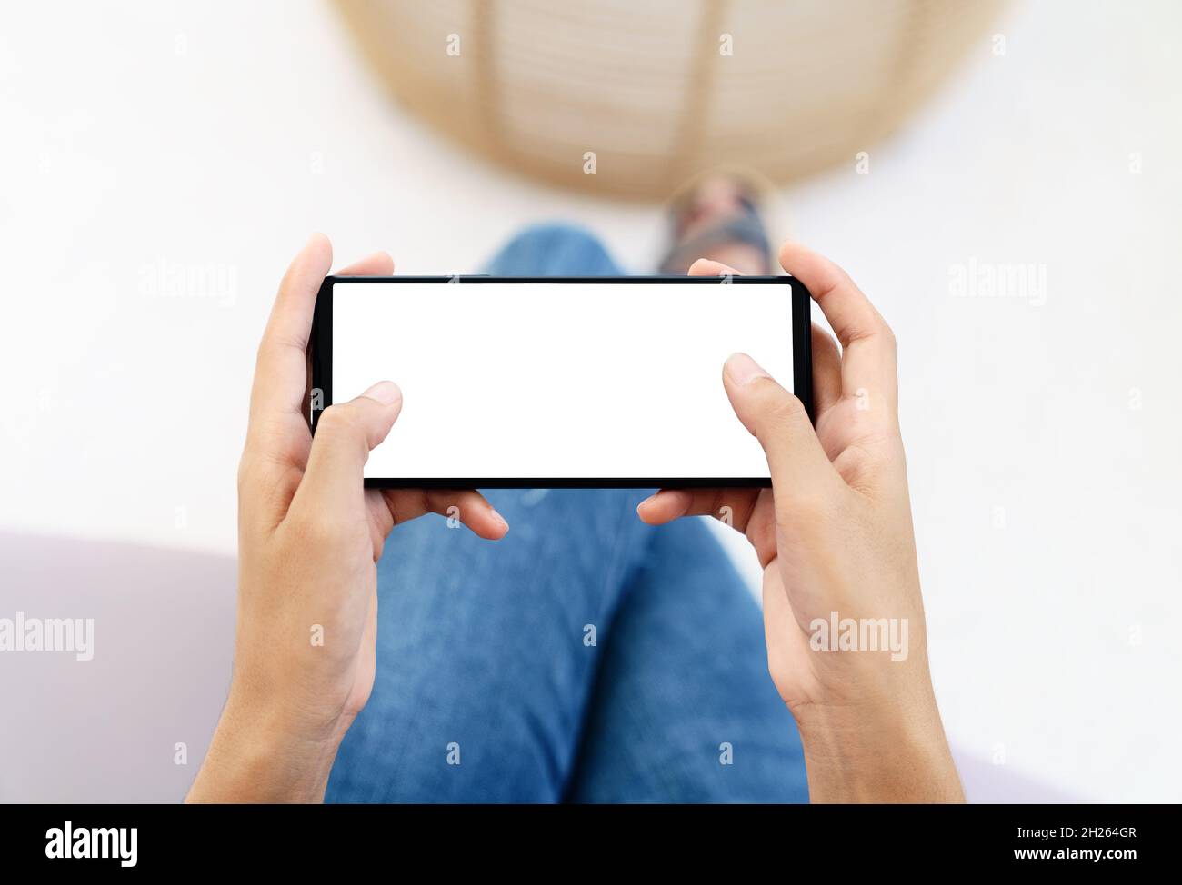 hand using cell phone in horizontal white screen display Stock Photo ...