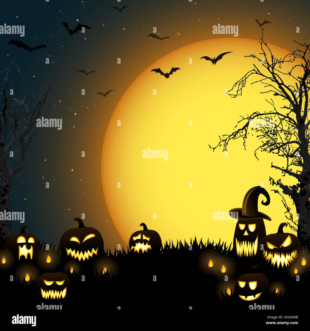 spooky halloween dead tree with some scary pumpkins in front of an ...