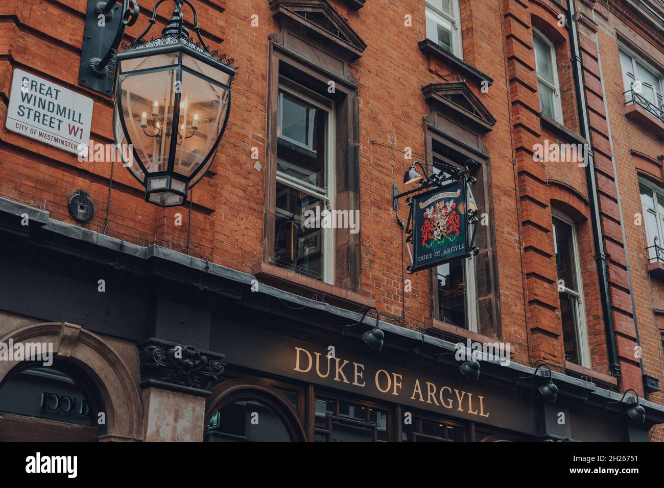 London, UK - October 02, 2021: Sign and emblem on the facade of The ...