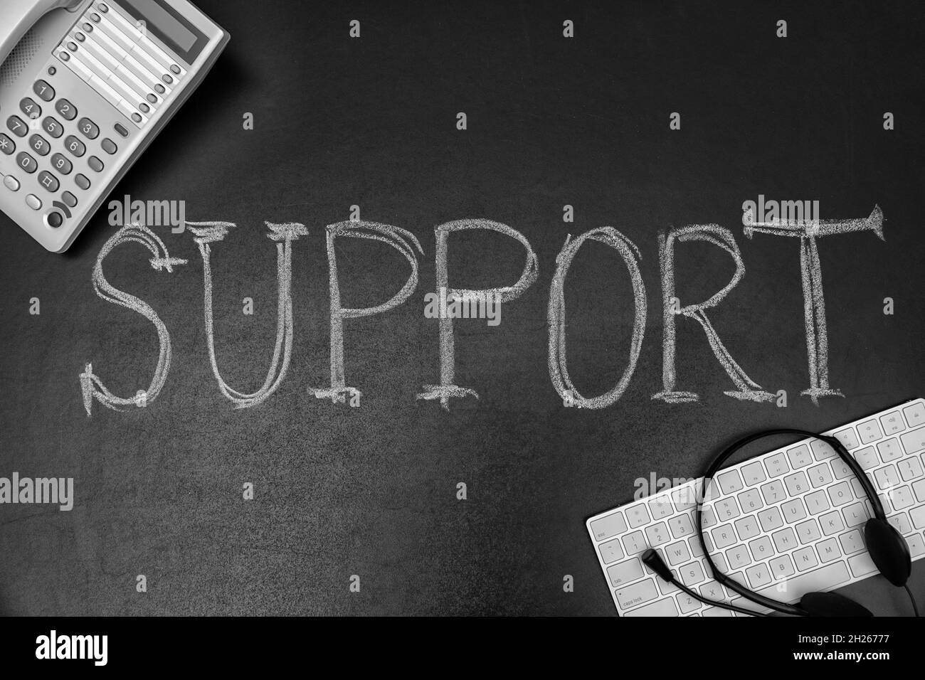 Flat lay composition with word "SUPPORT" on dark background. Technical ...