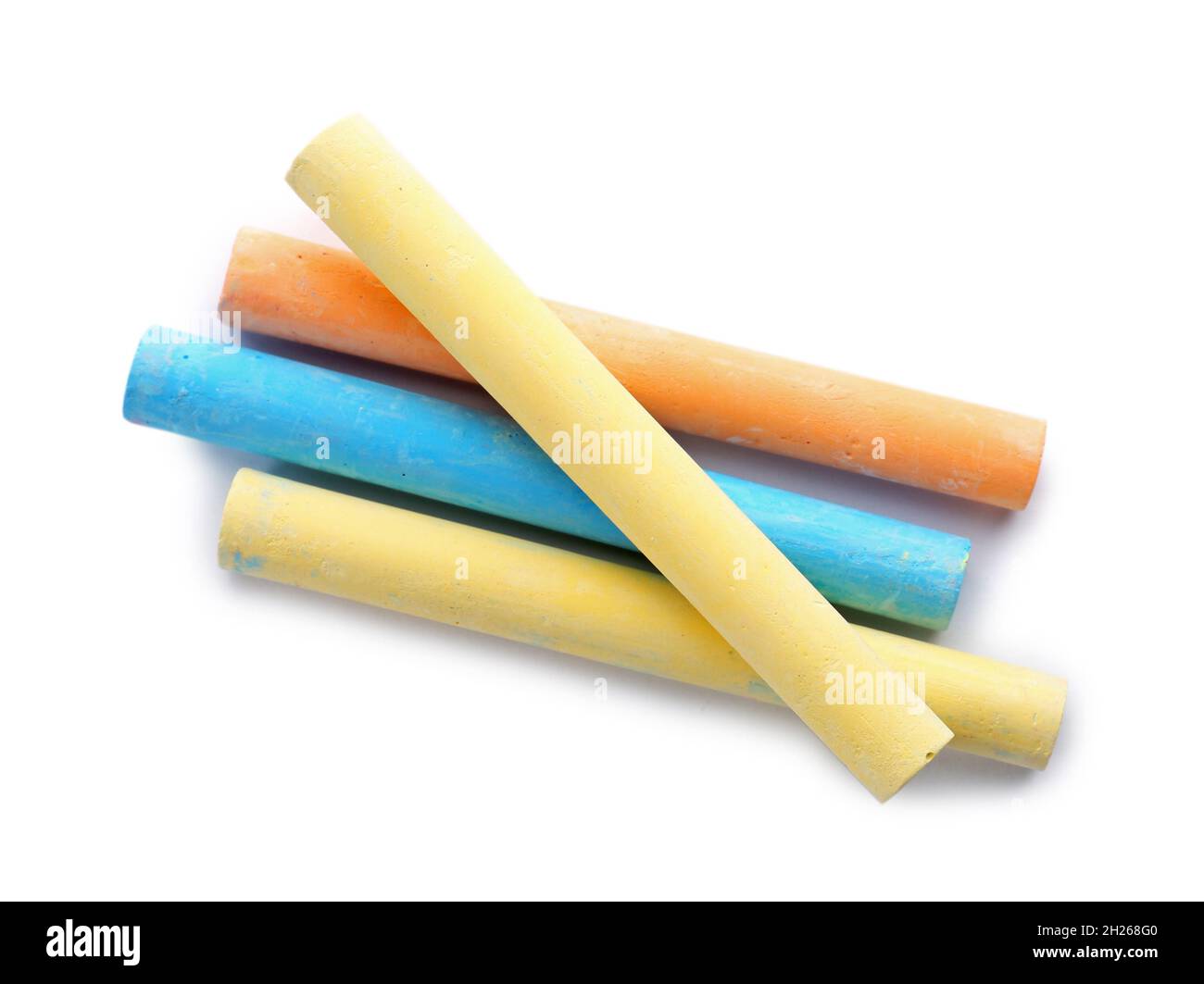 Color pieces of chalk on white background Stock Photo - Alamy