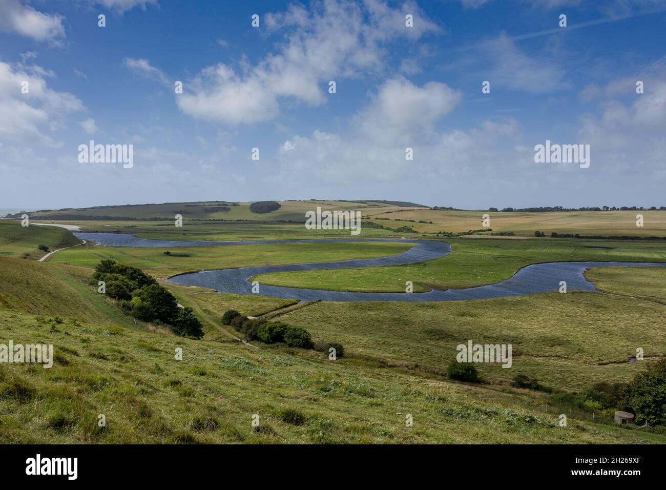 The meandering Cuckmere River in Cuckmere Valley at the Seven Sisters ...