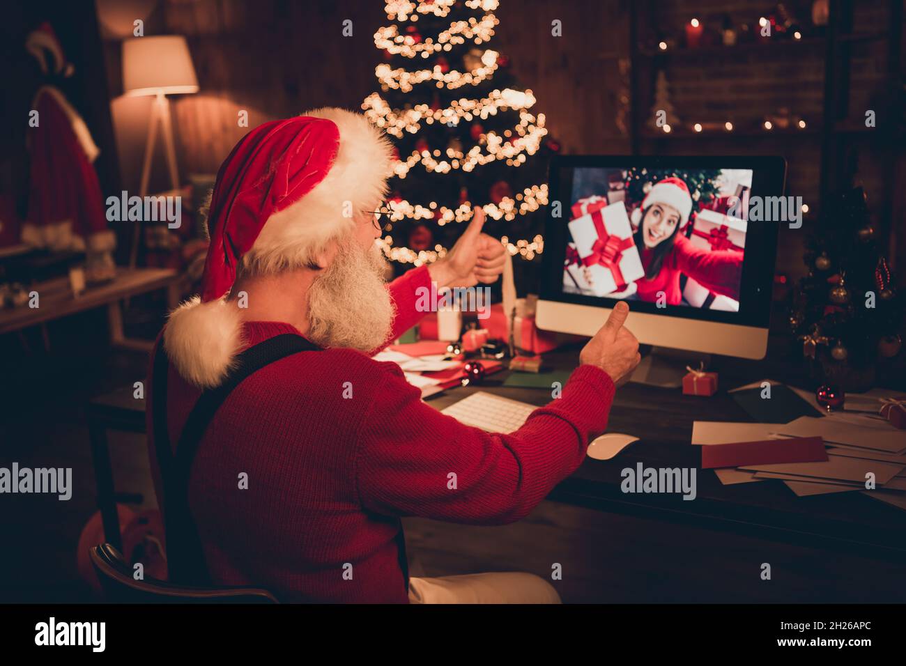 Photo of cute charming age santa claus wear red costume talking modern ...