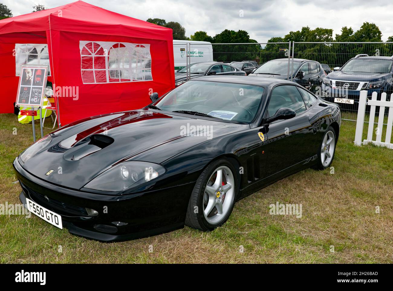 Three-quarters front view of a Black,1998, Ferrari 550 Maranello, on ...