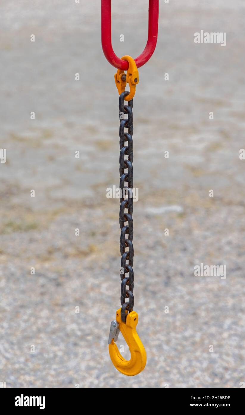 Yellow Hook at Chain Lifting Equipment Machine Stock Photo - Alamy