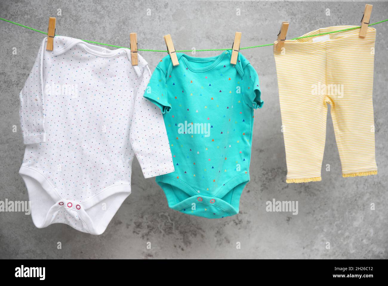 Baby Clothes On Washing Line High Resolution Stock Photography and ...